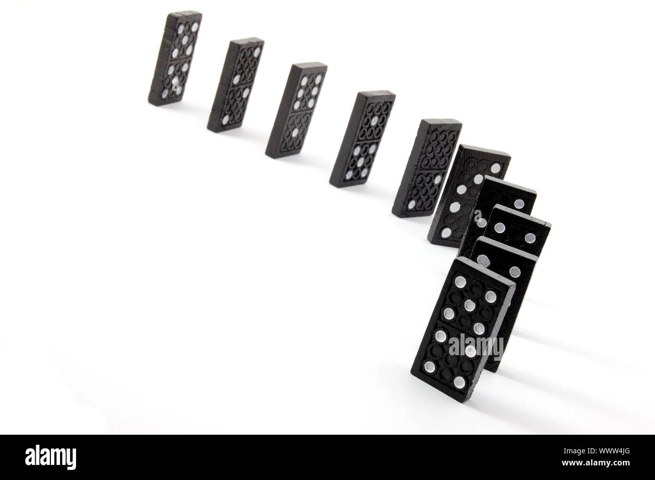 chain of dominoes isolated on a white background Stock Photo - Alamy