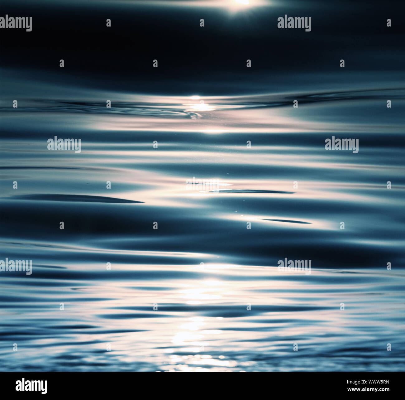 Sunshine sparkling sea waves Stock Photo - Alamy