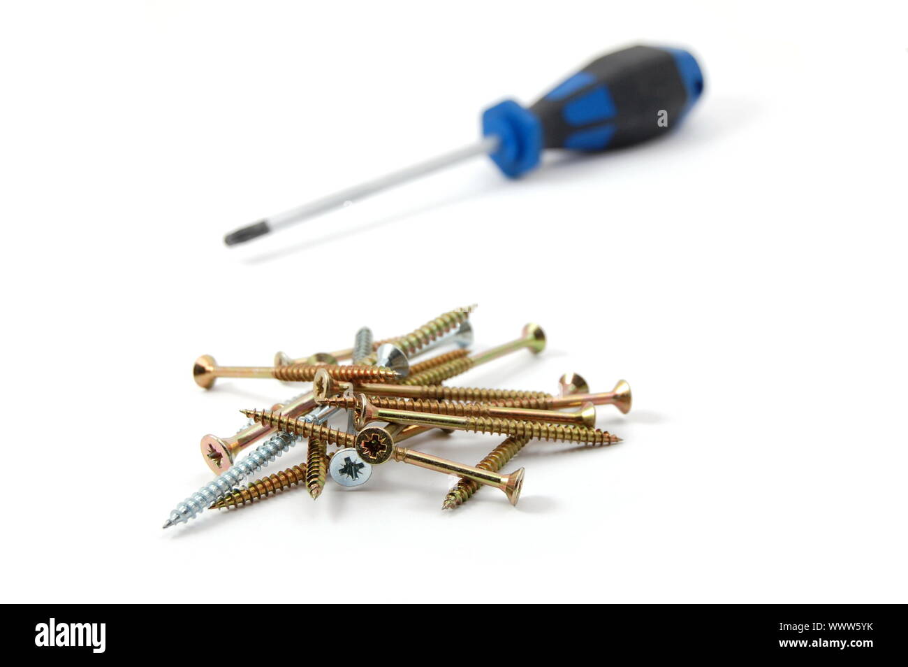 screwdriver and some screws isolated on white background Stock Photo ...