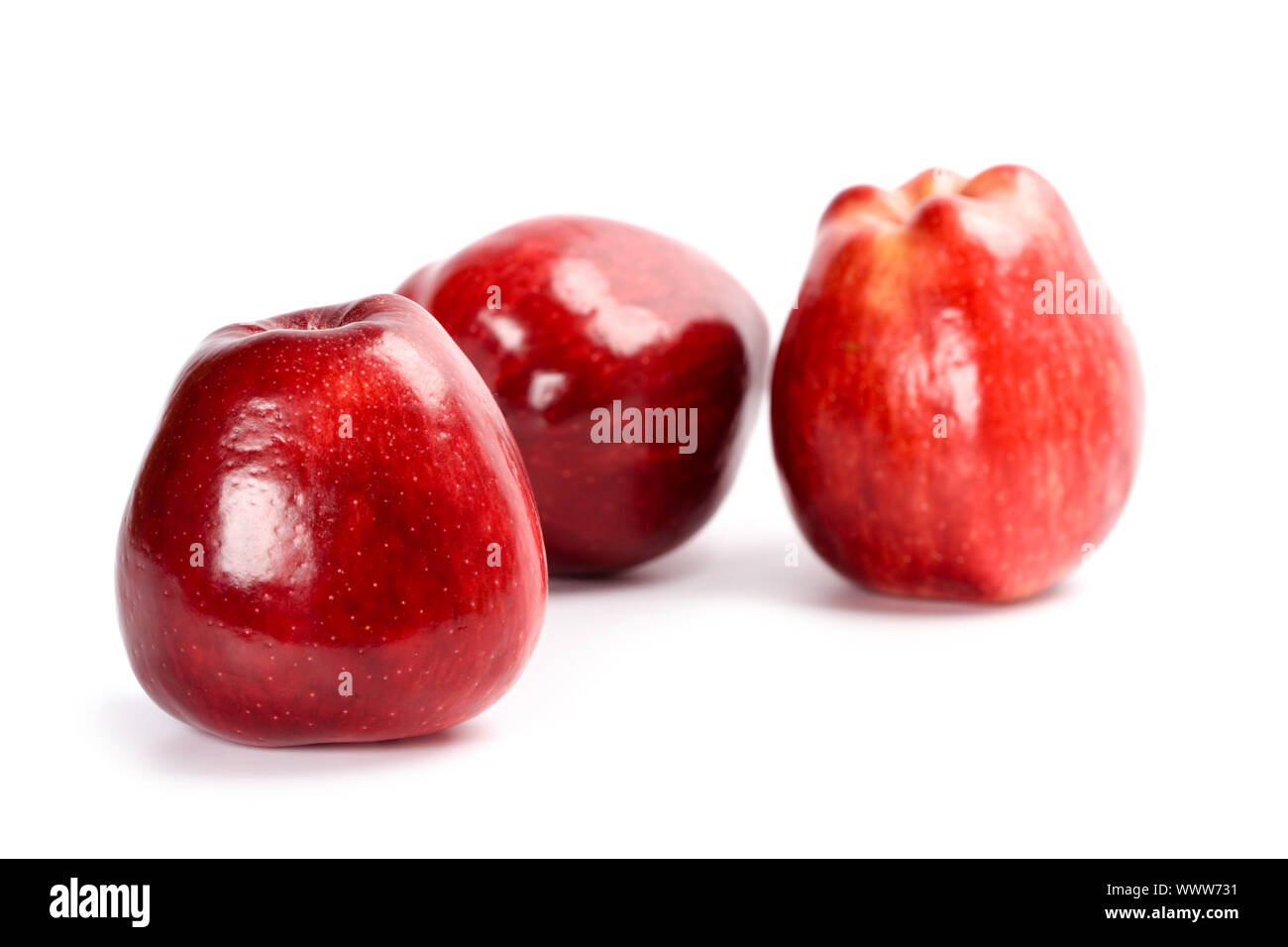 three red apples isolated on white background Stock Photo - Alamy