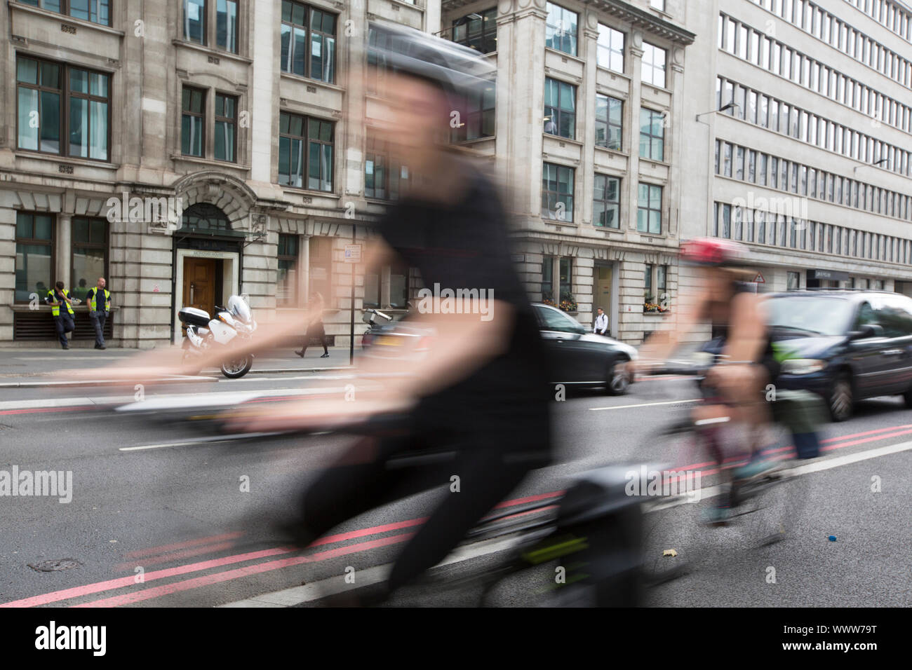 Cyclists on a cycle super highway along Farringdon Road, London, UK ...