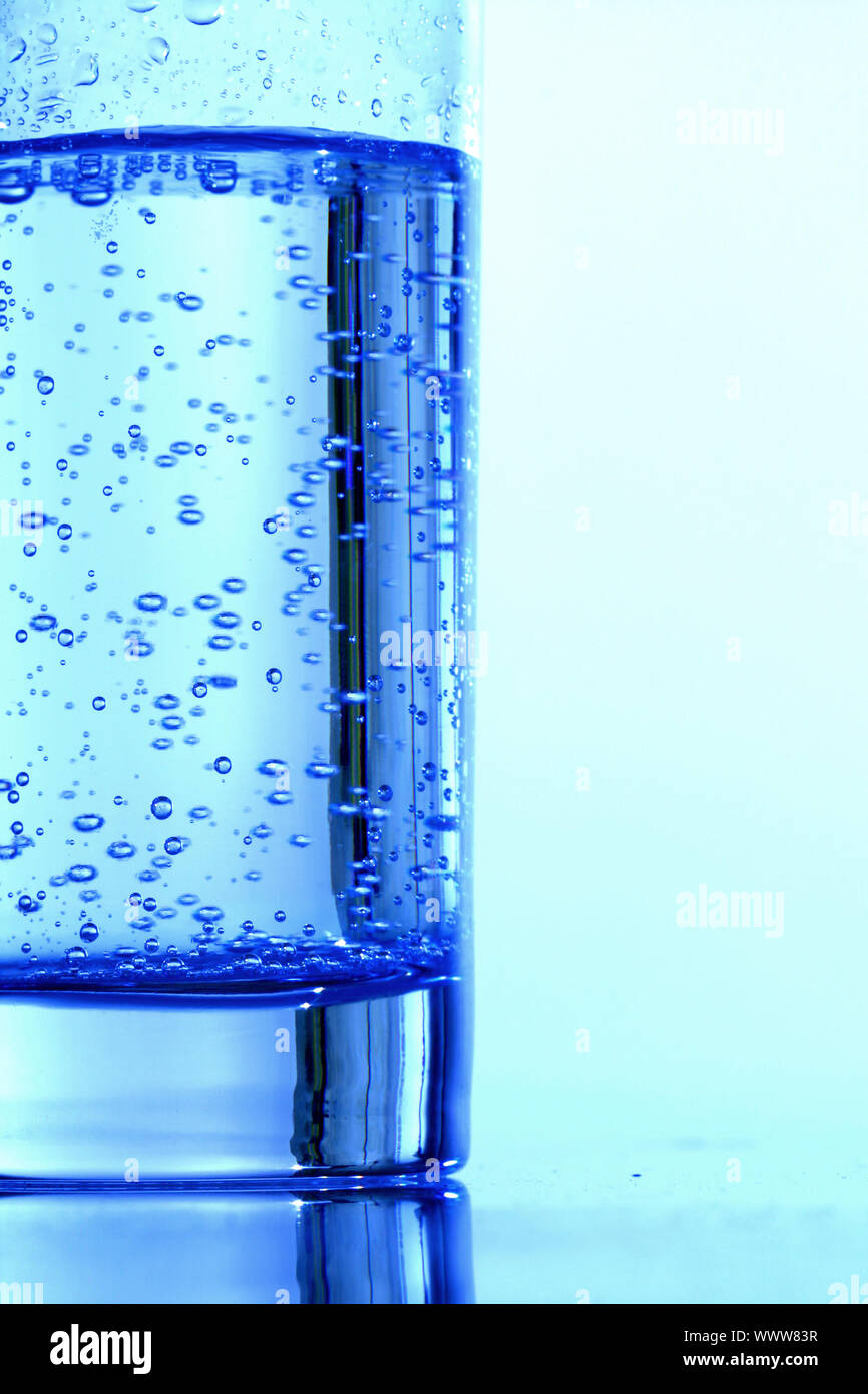blue bubbled water in glass Stock Photo - Alamy