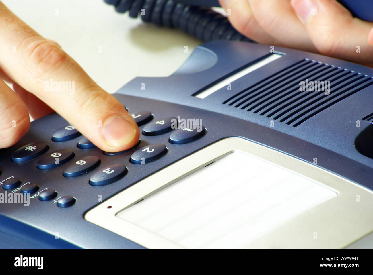 finger with blue telephone keypad Stock Photo - Alamy