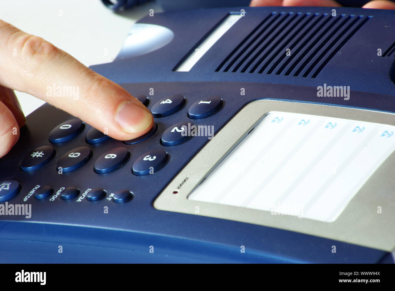 finger with blue telephone keypad Stock Photo - Alamy