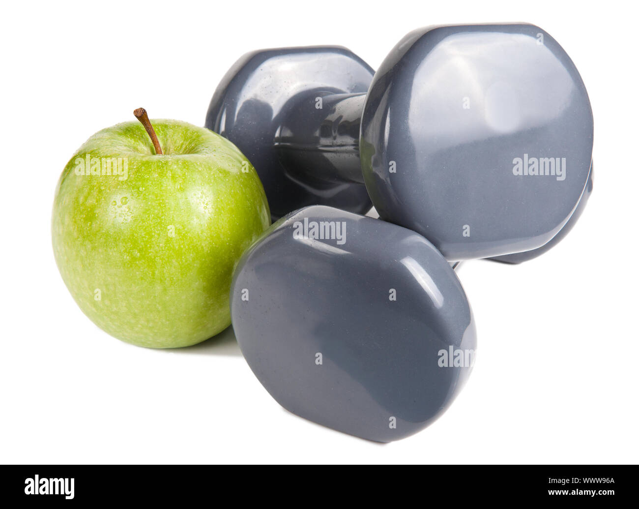 Apple and a pair of dumbbells. Exercise and healthy diet concept Stock ...
