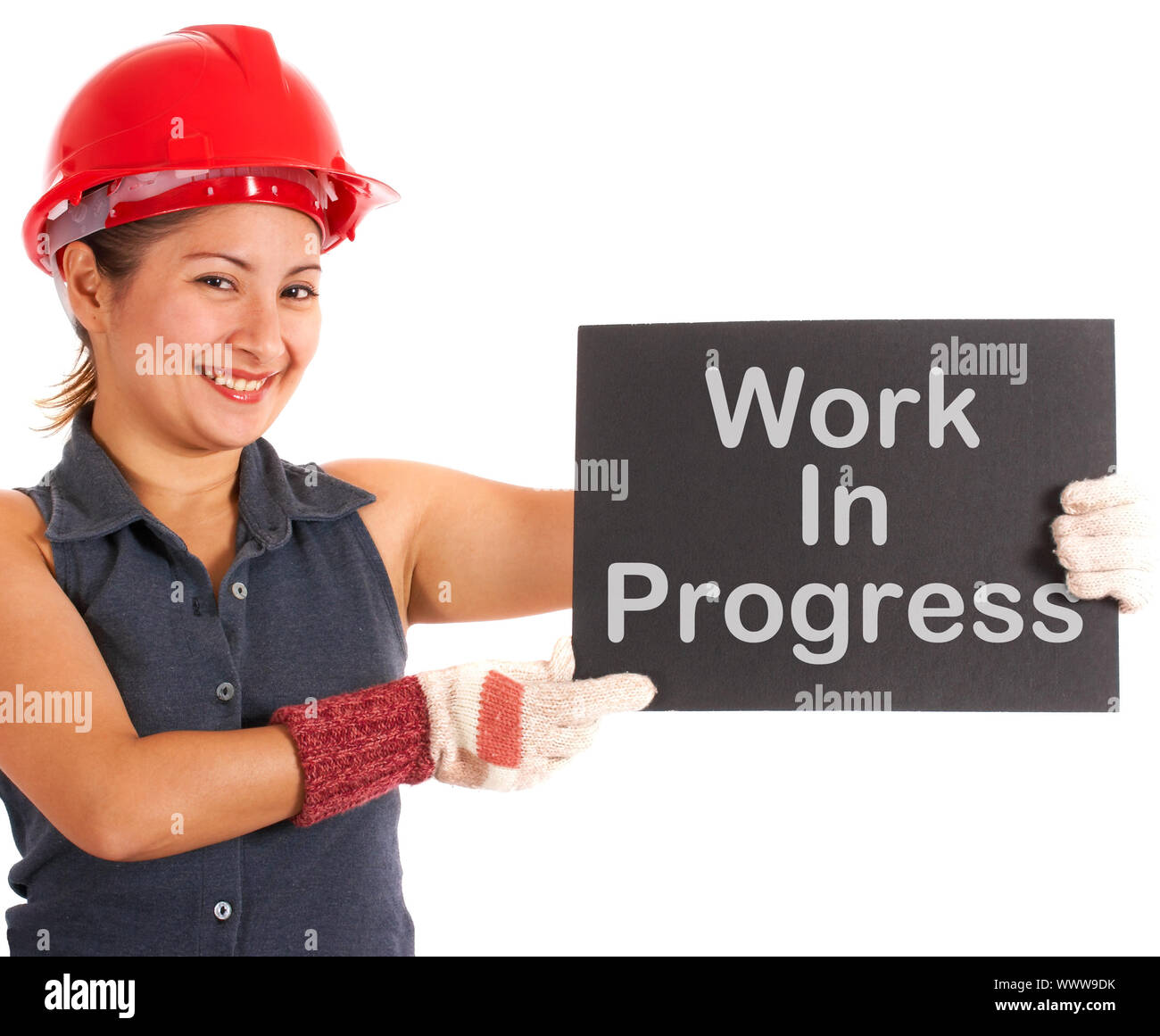 Work In Progress Sign Held By A Construction Worker Stock Photo - Alamy
