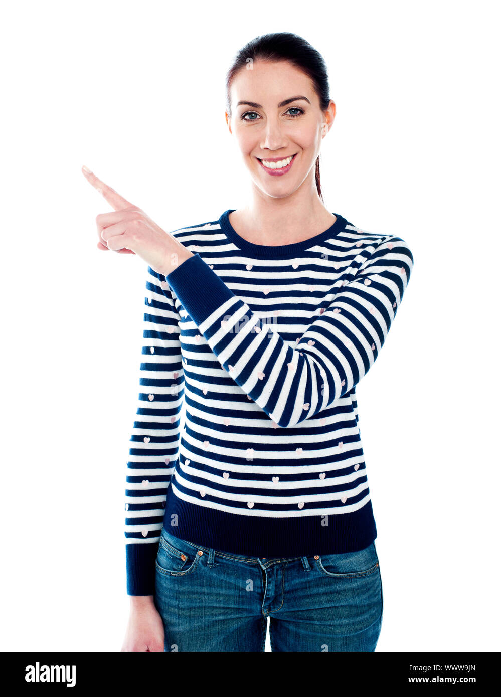 Woman pointing index finger at something over white background Stock ...
