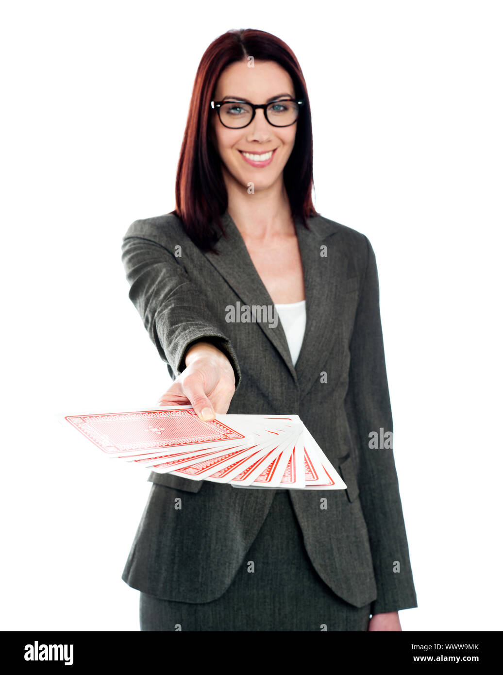 Smiling womans with playing card wearing spectacles Stock Photo - Alamy