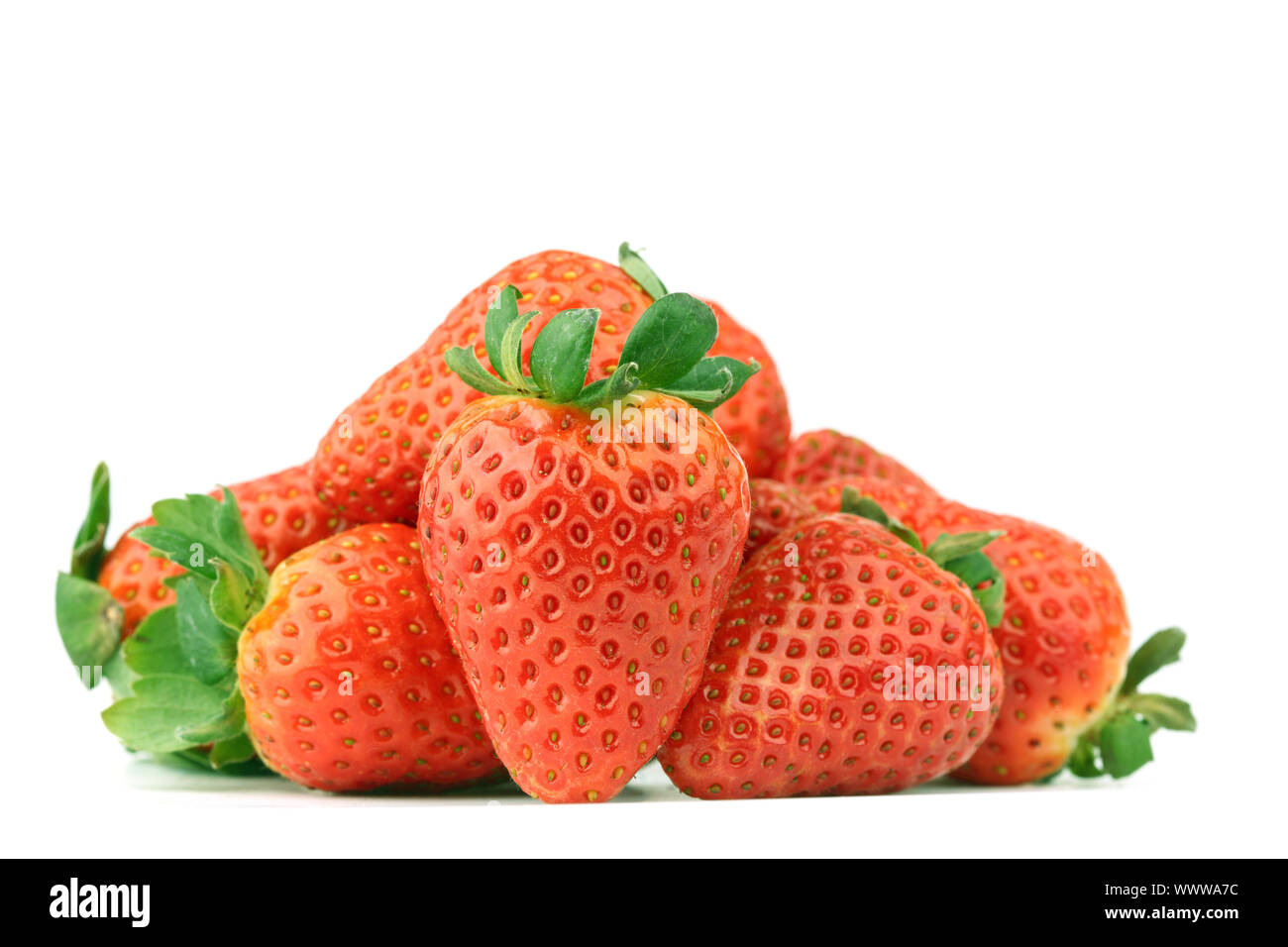 strawberry pile on white background Stock Photo - Alamy