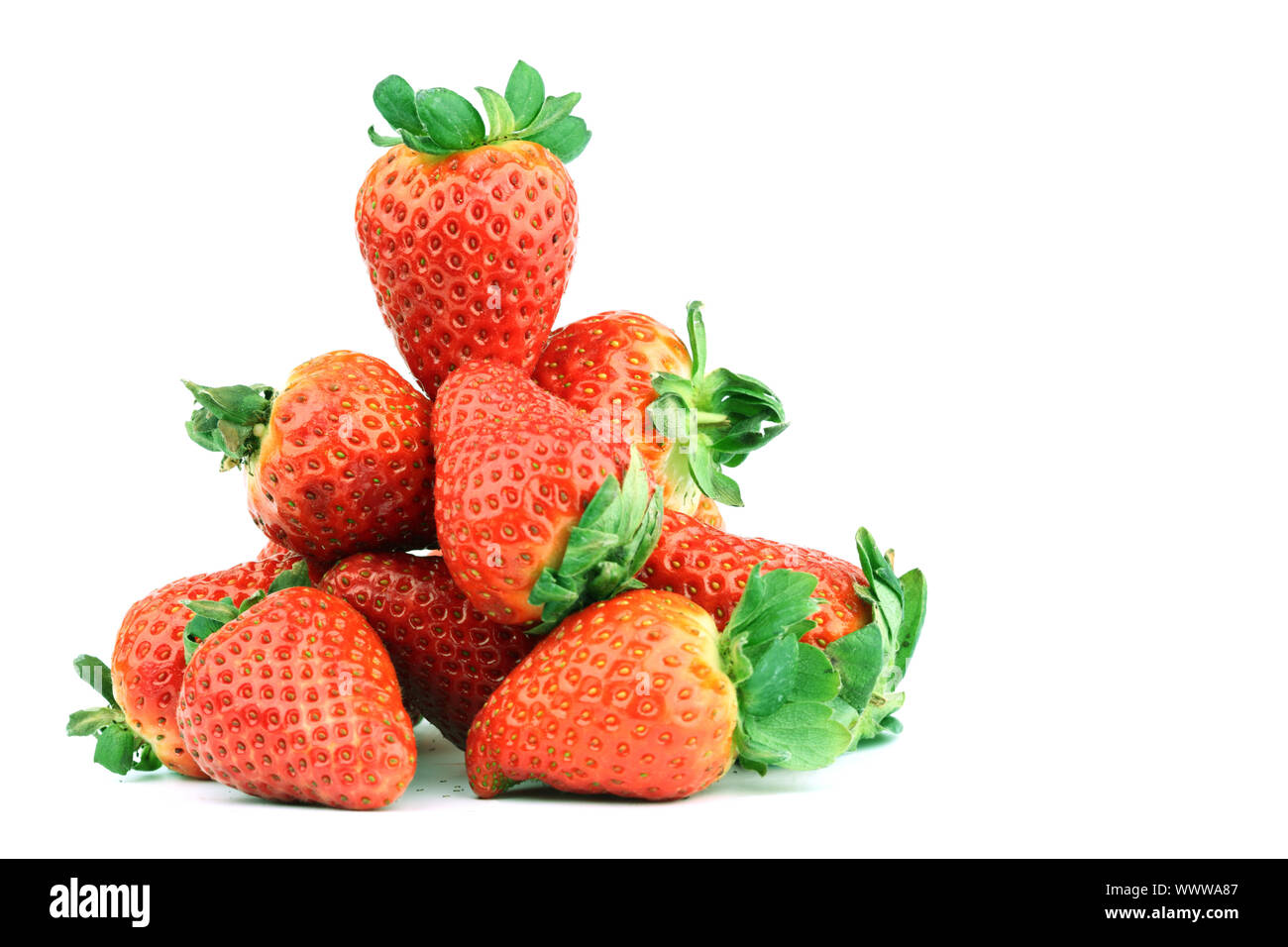 strawberry pile on white background Stock Photo - Alamy