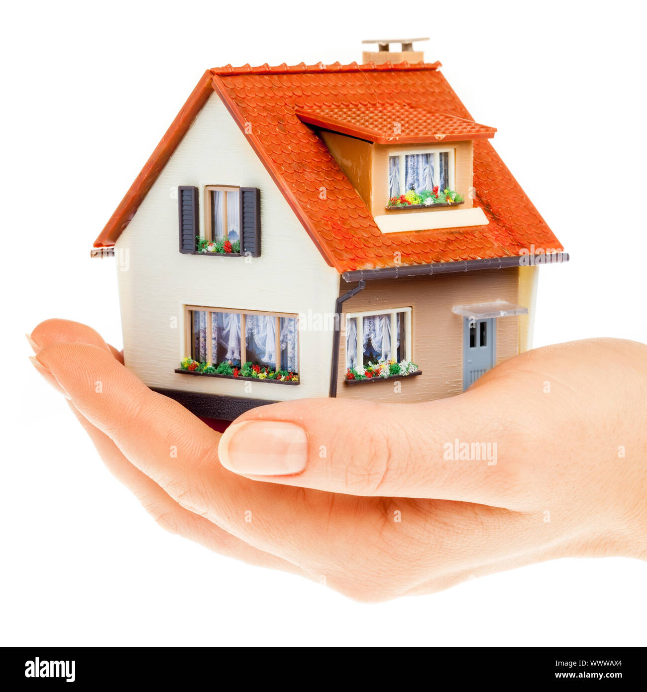 house in human hands on a white background Stock Photo - Alamy