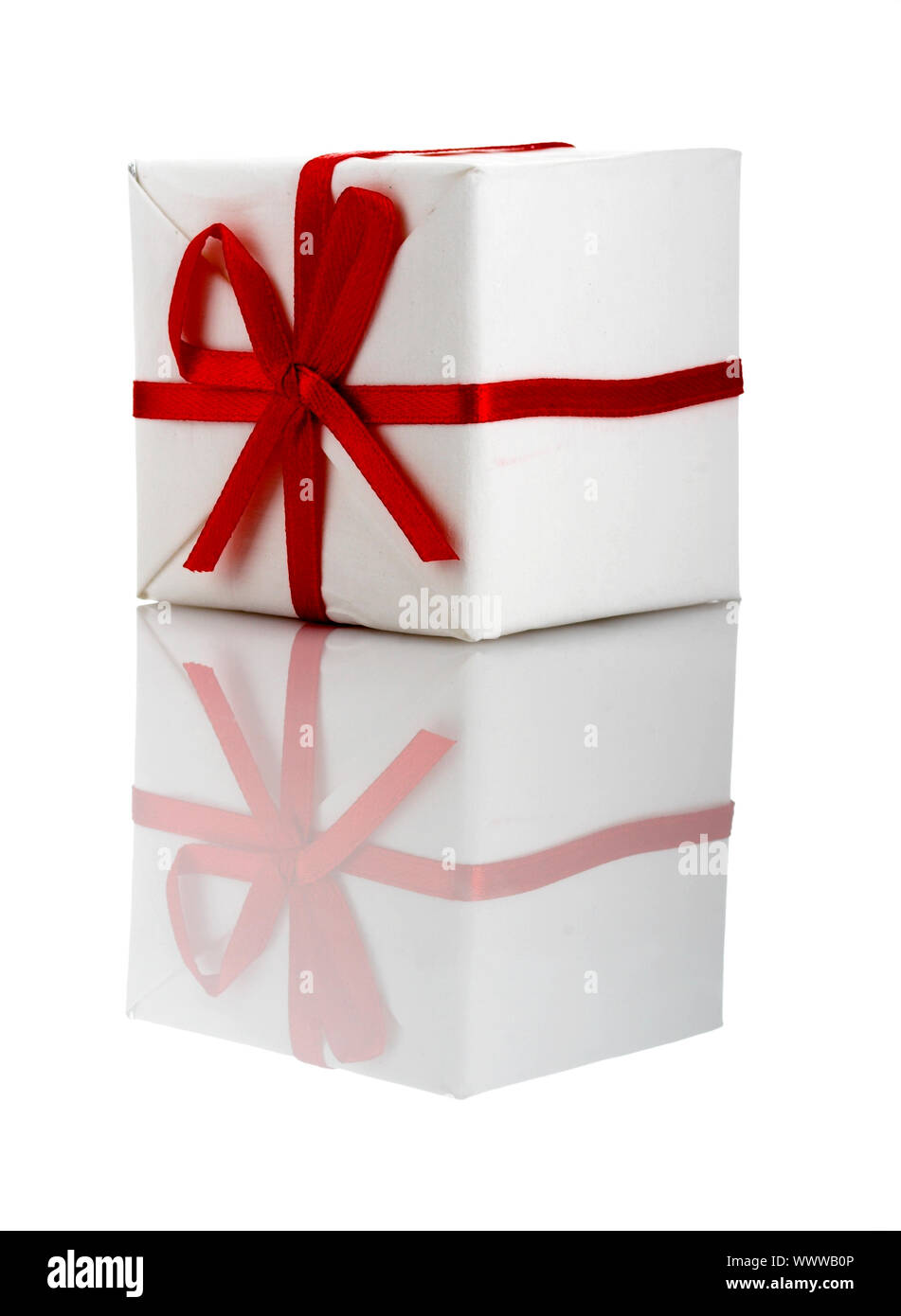 Christmas season! Small gift boxes with reflection Stock Photo - Alamy