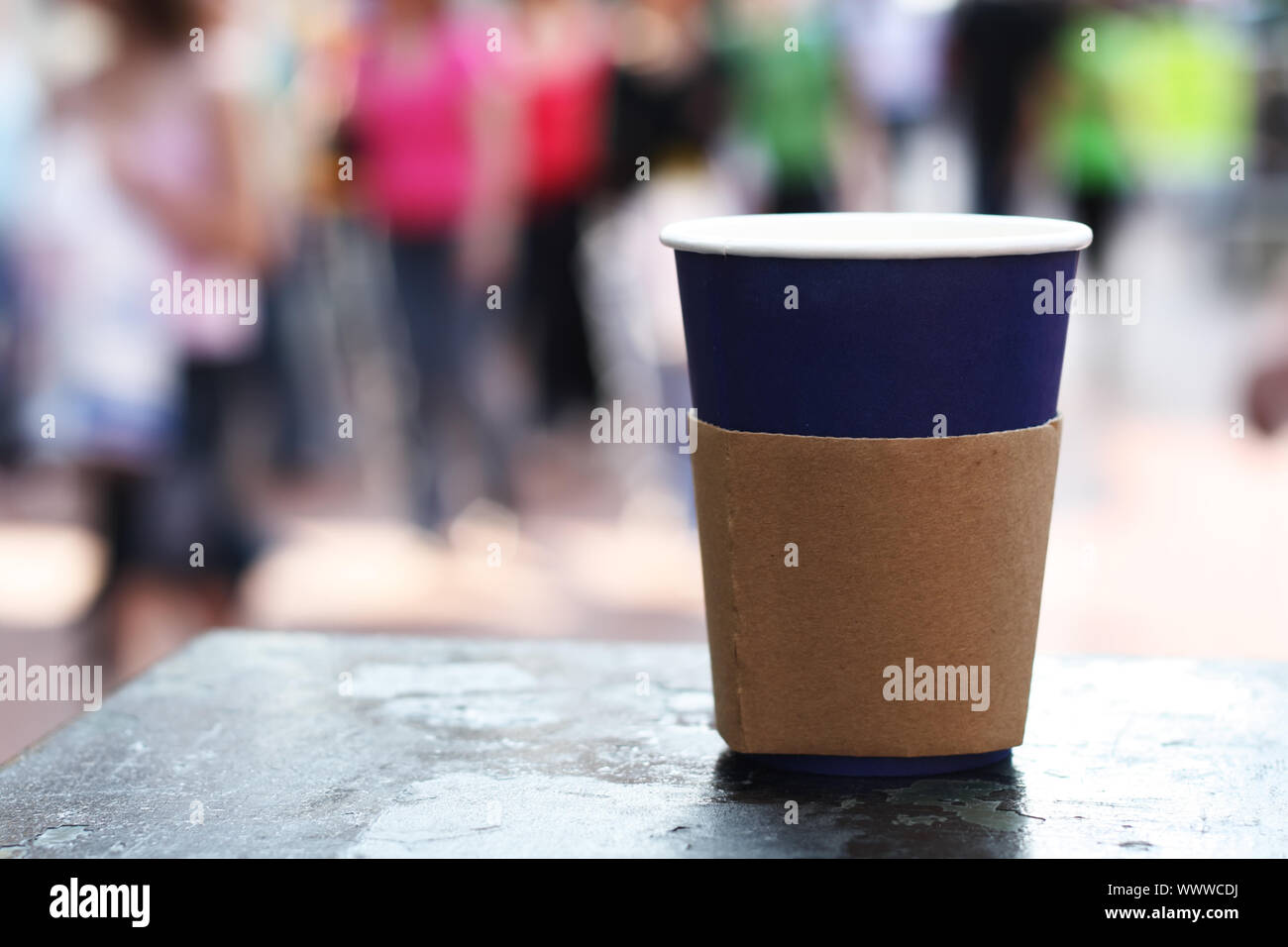 blue opened coffee cap on a street background Stock Photo - Alamy