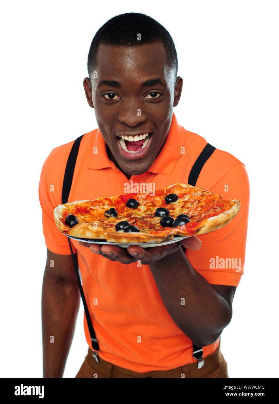 Boy in uniform offering pizza isolated on white background Stock Photo ...
