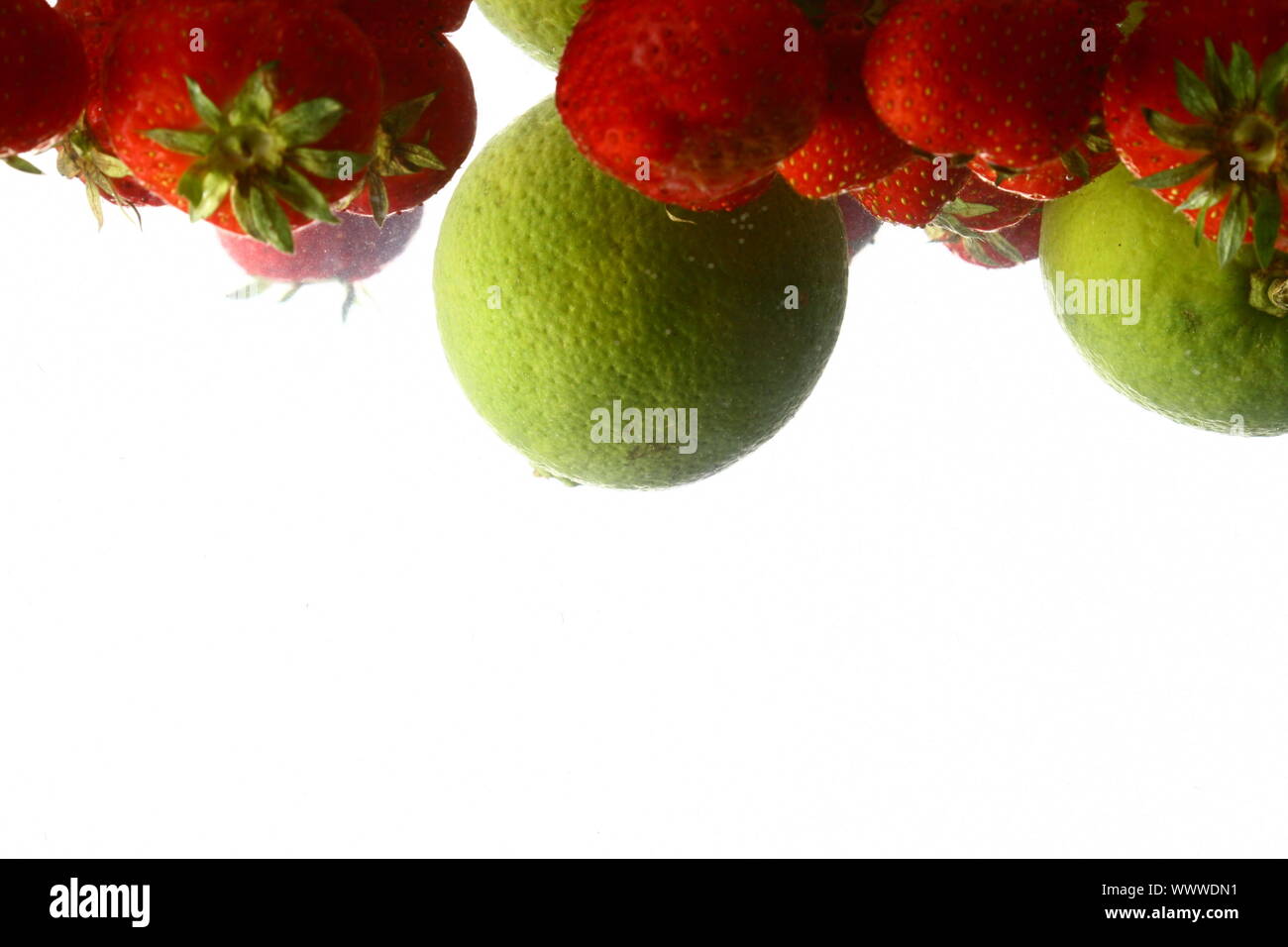 lime splash isolated on white background Stock Photo - Alamy