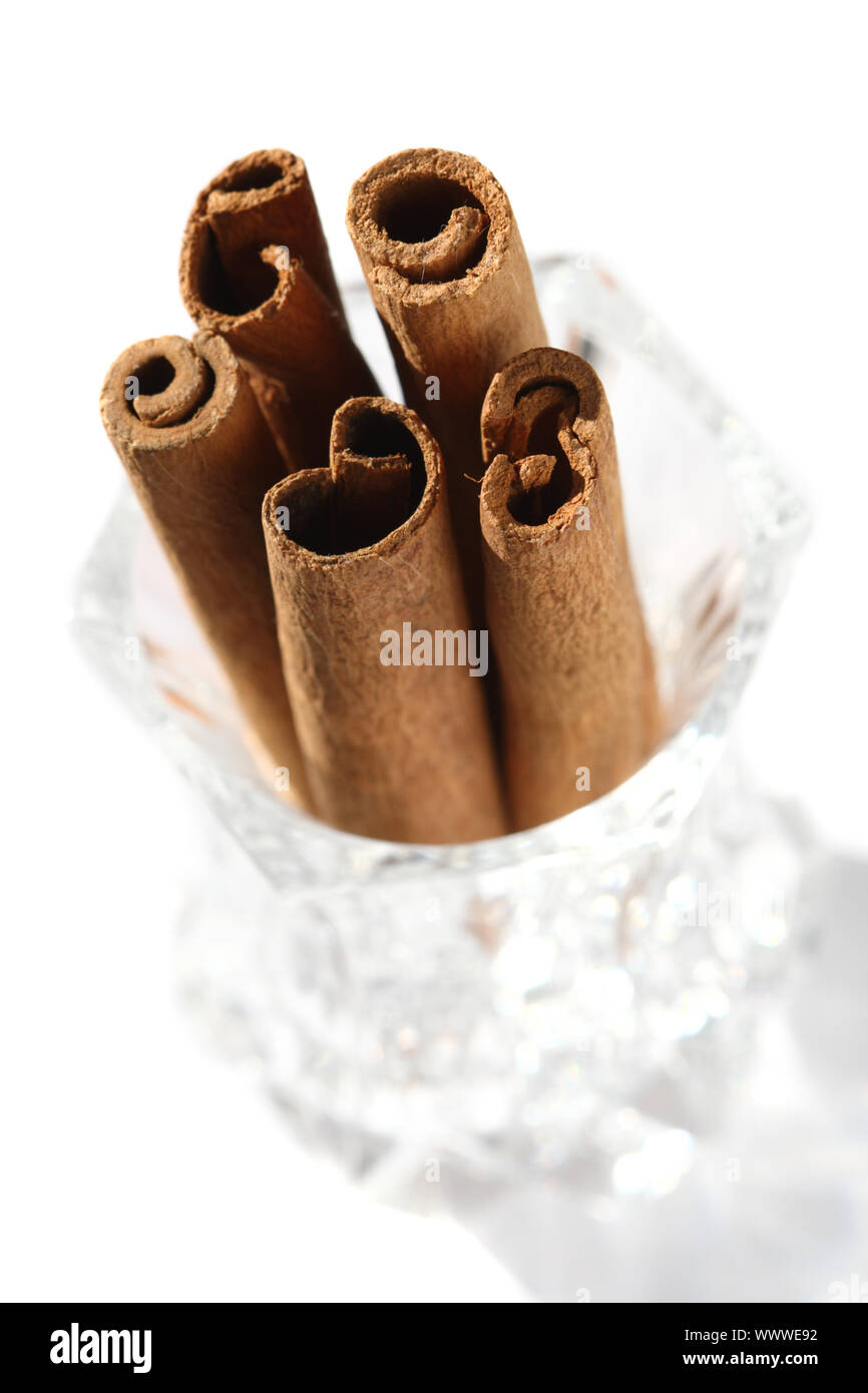 cinnamon sticks in a crystal glass, top view, light shadow Stock Photo ...