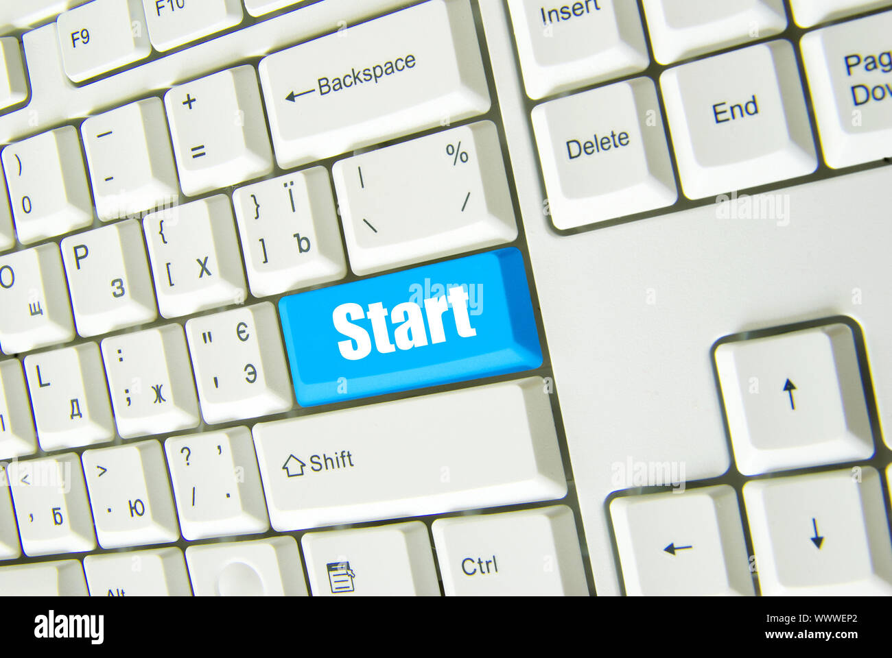 Keyboard blue key Start . business concept Stock Photo - Alamy