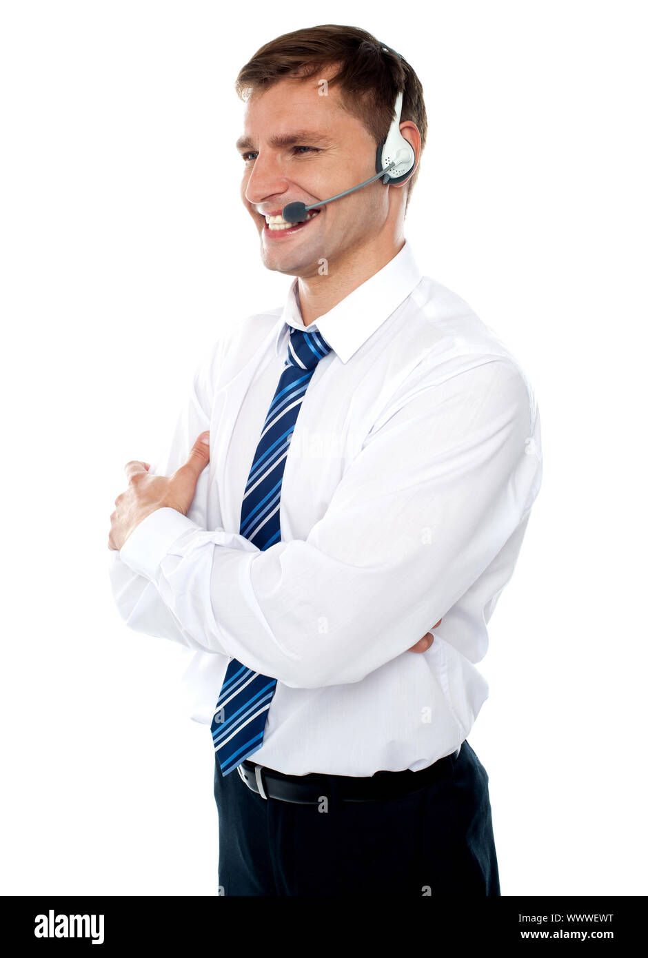 Smiling customer support executive posing with folded arms Stock Photo ...