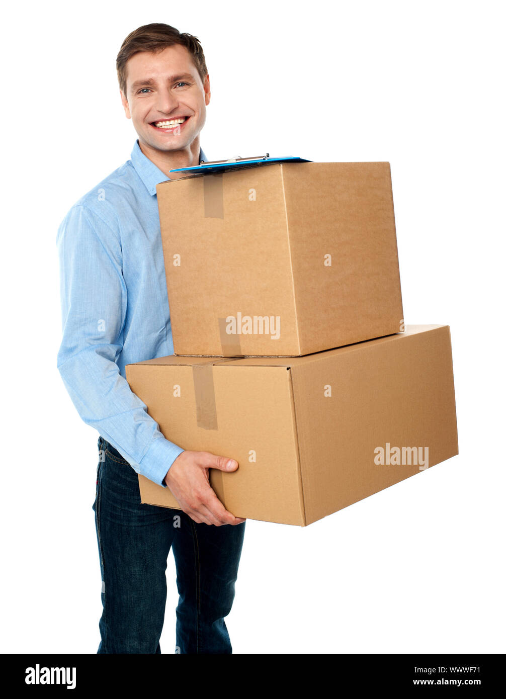 Smart young man carrying boxes with clipboard placed above them Stock ...