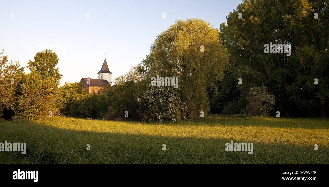 landscape of Merkenich district with St. Brictius church, Cologne ...