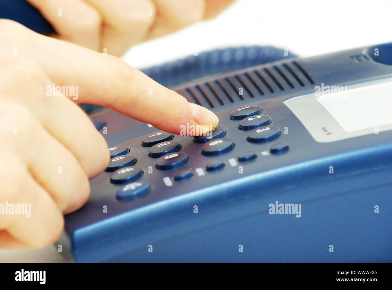 finger with blue telephone keypad Stock Photo - Alamy