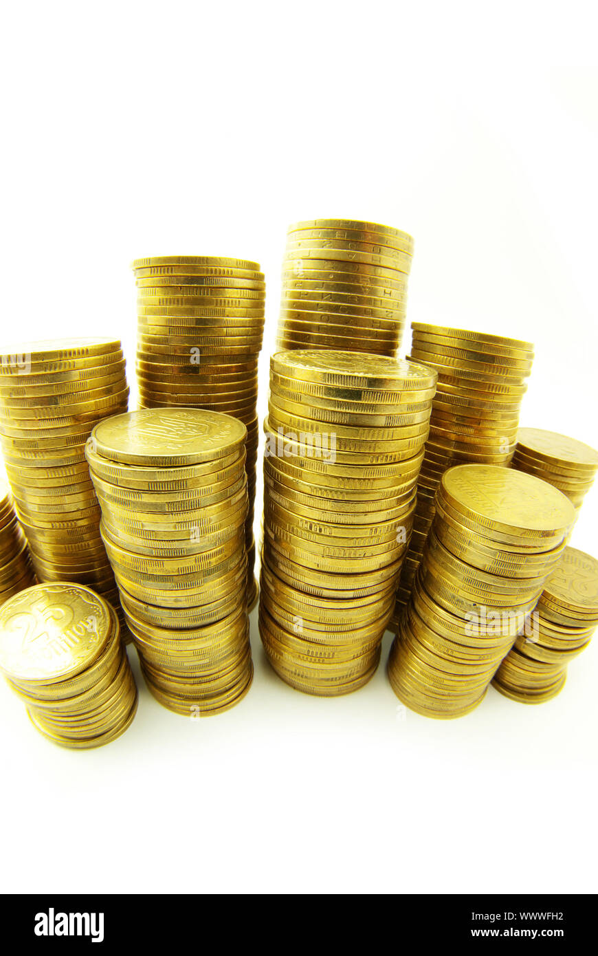 towers of coins isolated on a whiteness Stock Photo - Alamy