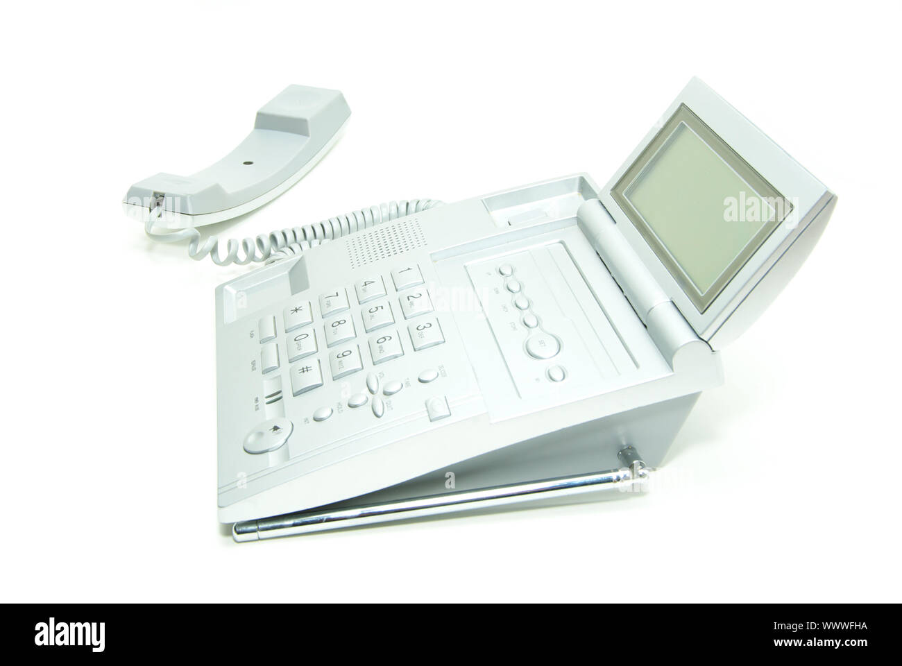 grey office telephone on a white background Stock Photo - Alamy