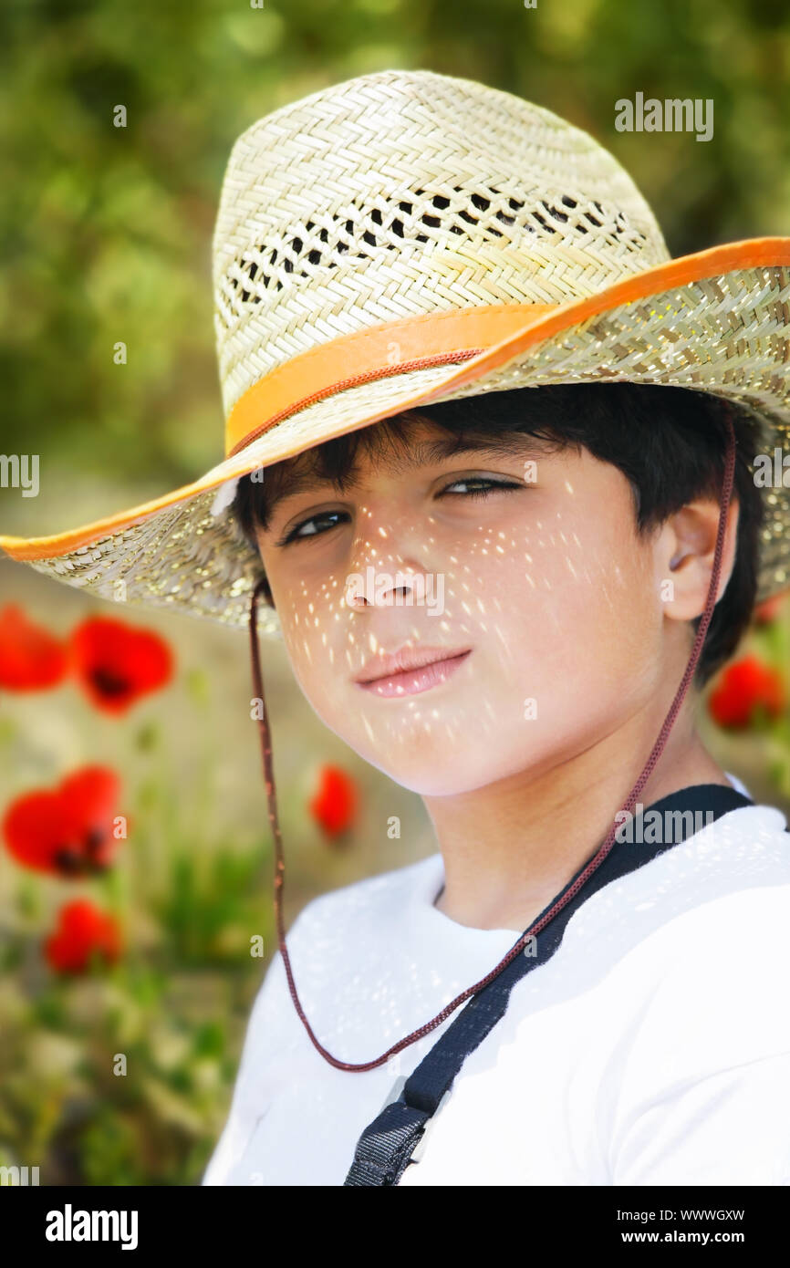 Portrait of a young beautiful boy in the garden Stock Photo - Alamy