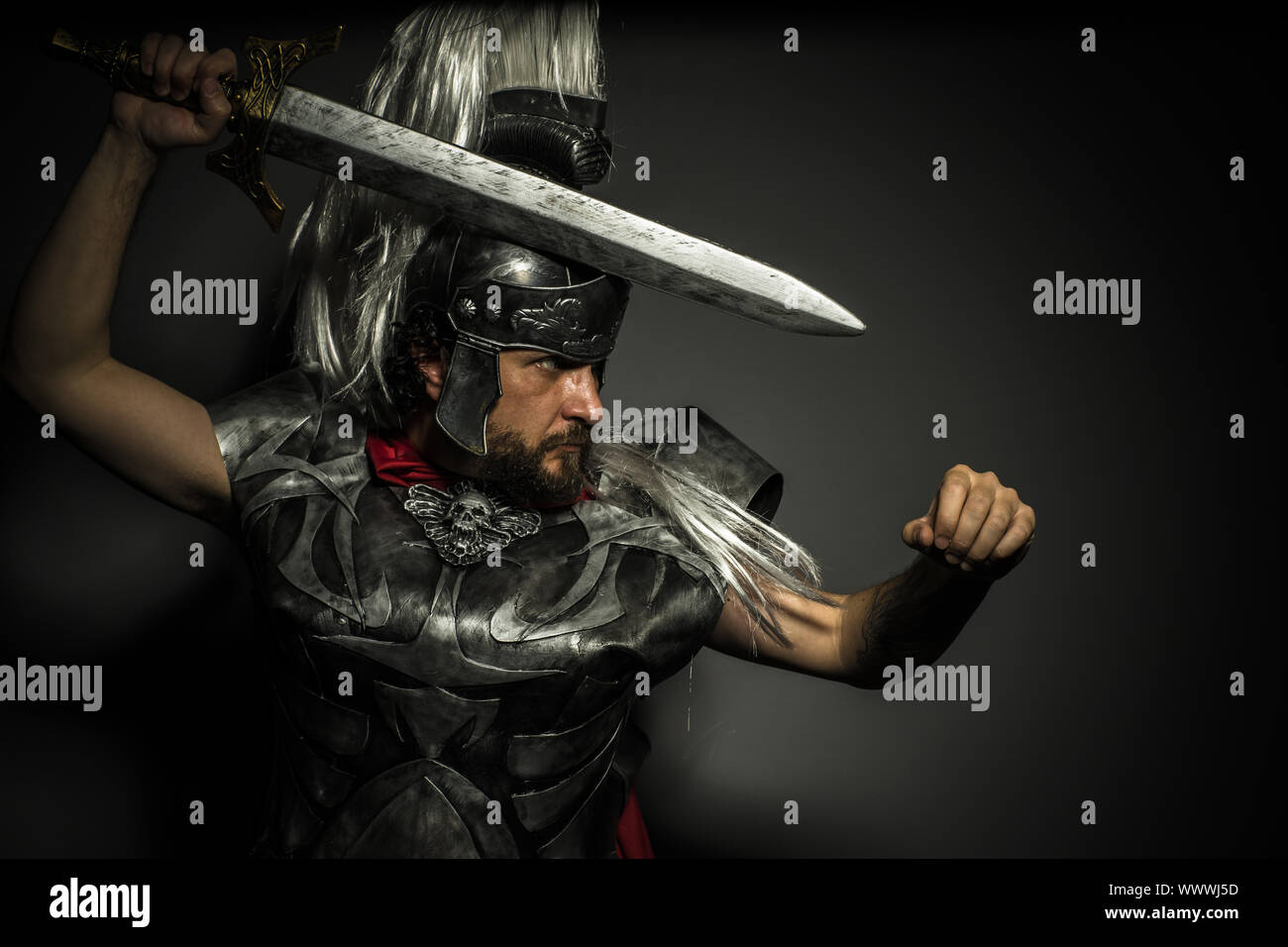 Gladiator, Roman centurion with armor and helmet with white chalk ...