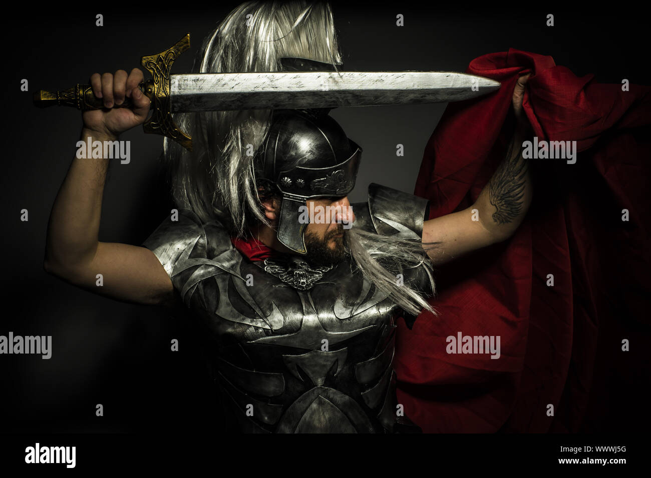 Gladiator, Roman centurion with armor and helmet with white chalk ...
