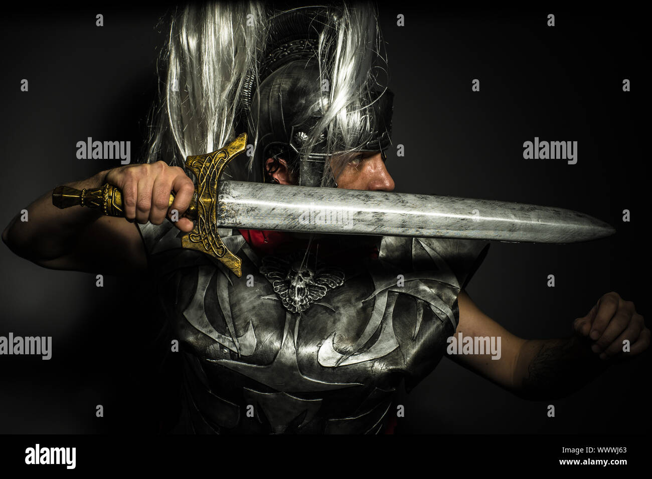 Caesar, Roman centurion with armor and helmet with white chalk, steel ...