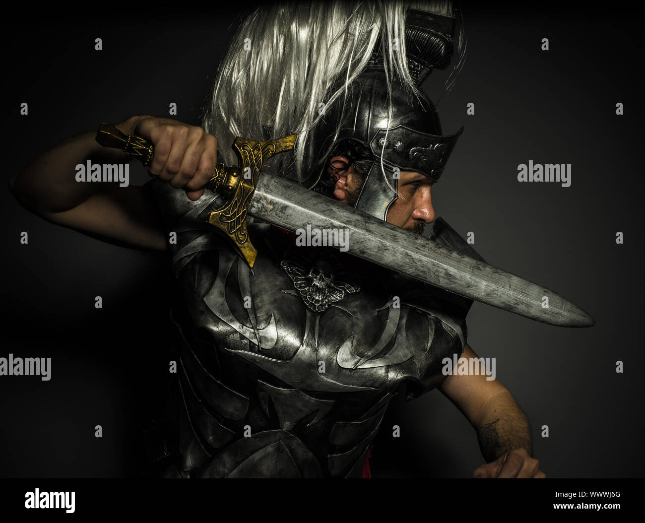 Caesar, Roman centurion with armor and helmet with white chalk, steel ...