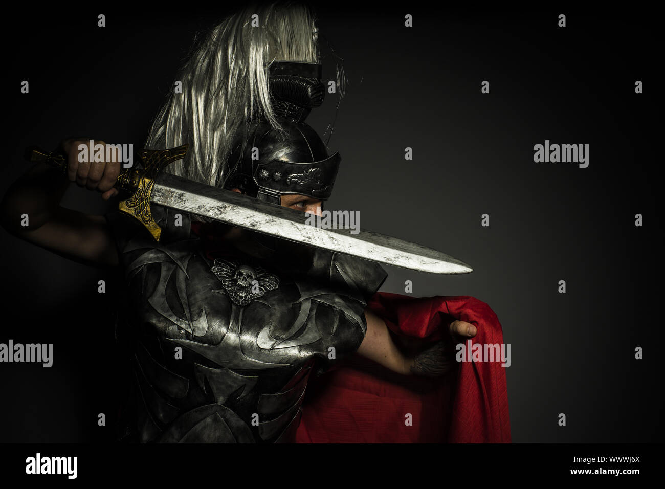 Caesar, Roman centurion with armor and helmet with white chalk, steel ...
