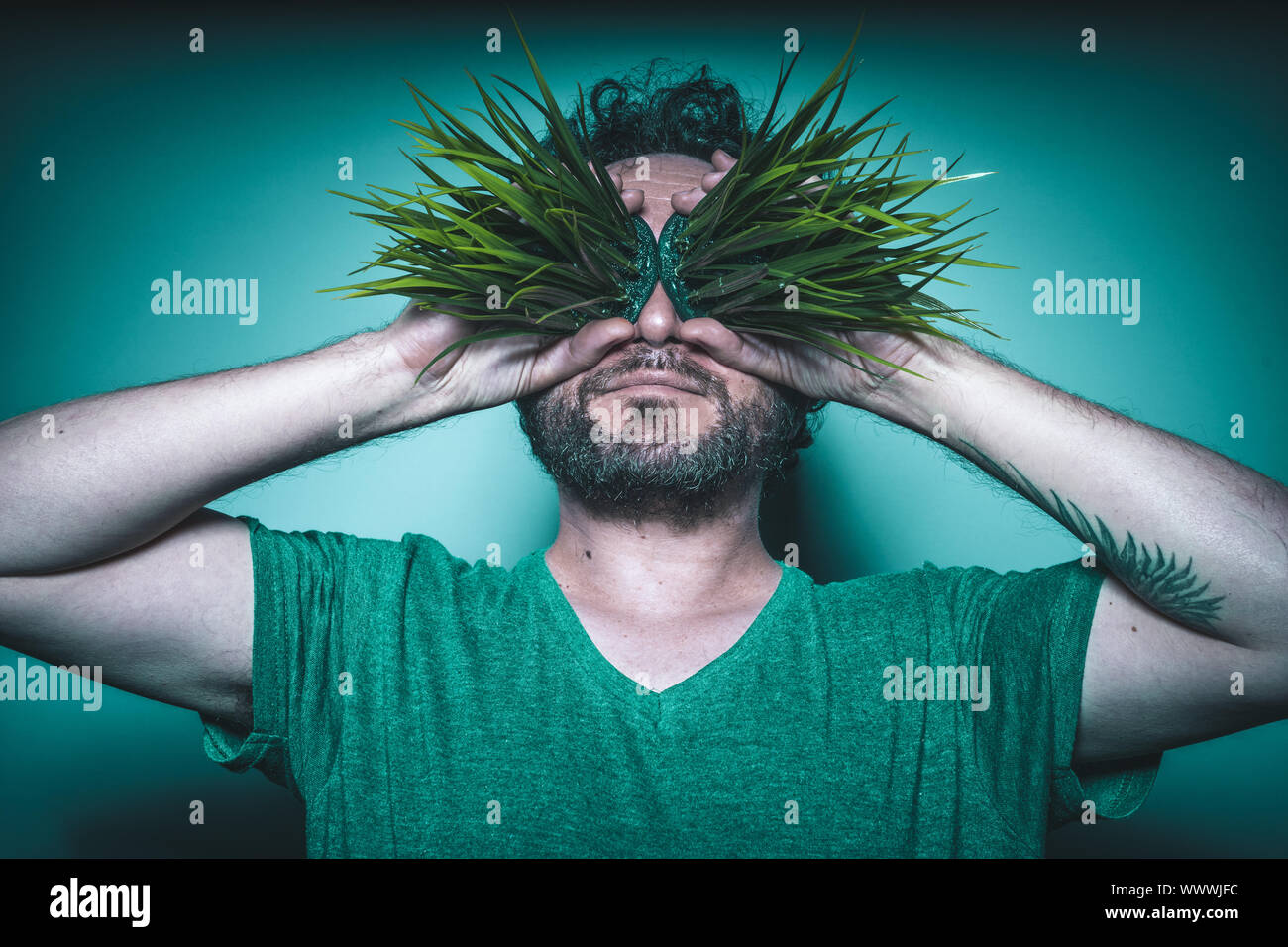 Weed, Concept of addiction to drugs, man with grass in eyes with ...