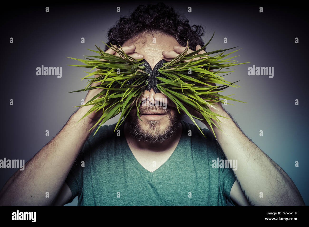 Cannabis, Concept of addiction to drugs, man with grass in eyes with ...