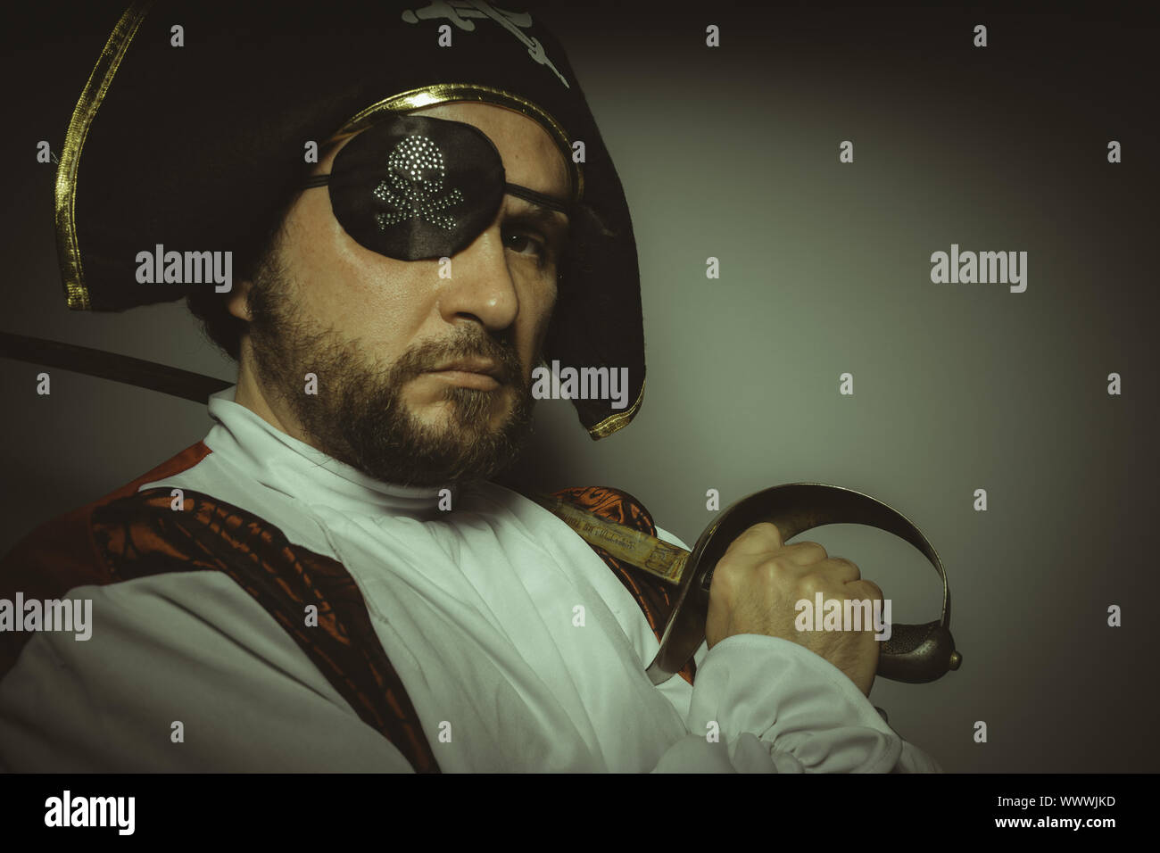 Sailor, Man with beard dressed like a pirate, with eye patch and steel ...