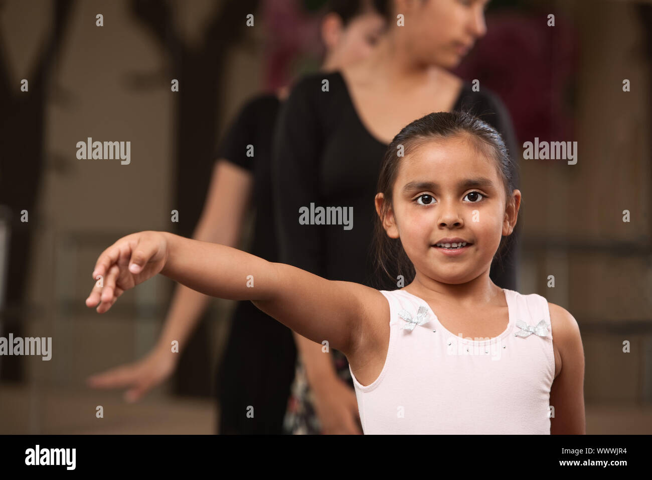 Cute young ballet student practicing in a dance studio Stock Photo - Alamy