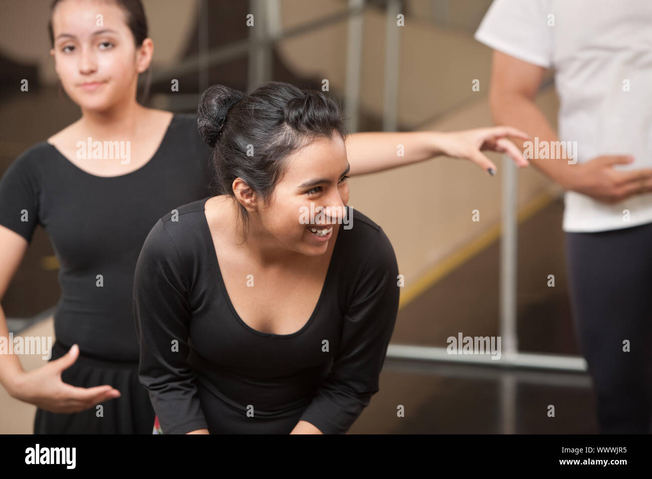 Female ballet student laughing during dance practice Stock Photo - Alamy