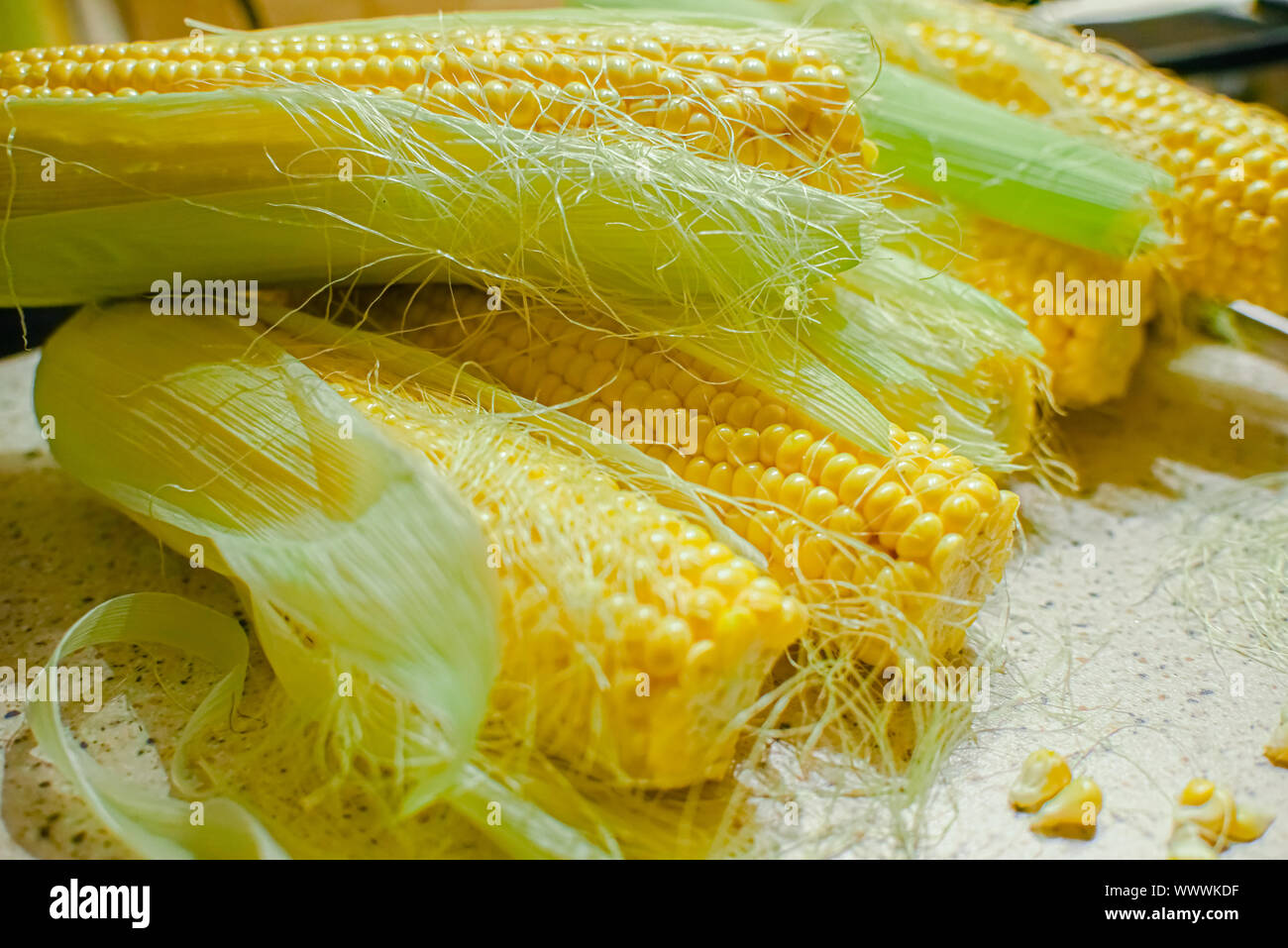 Fresh corn in the kitchen. Corncob. Rustic style Stock Photo - Alamy