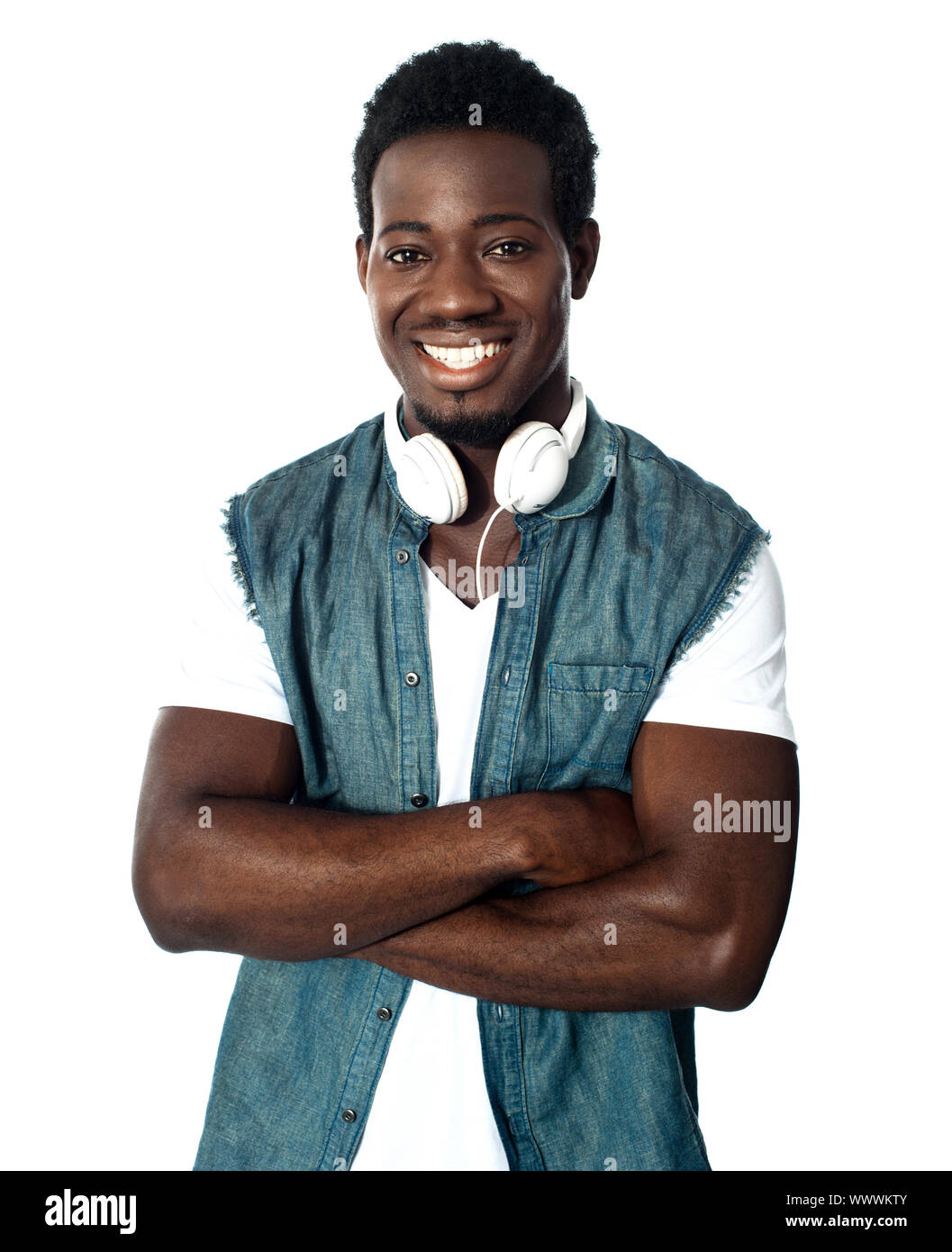 Smiling african boy loves music. Headphones around his neck Stock Photo ...