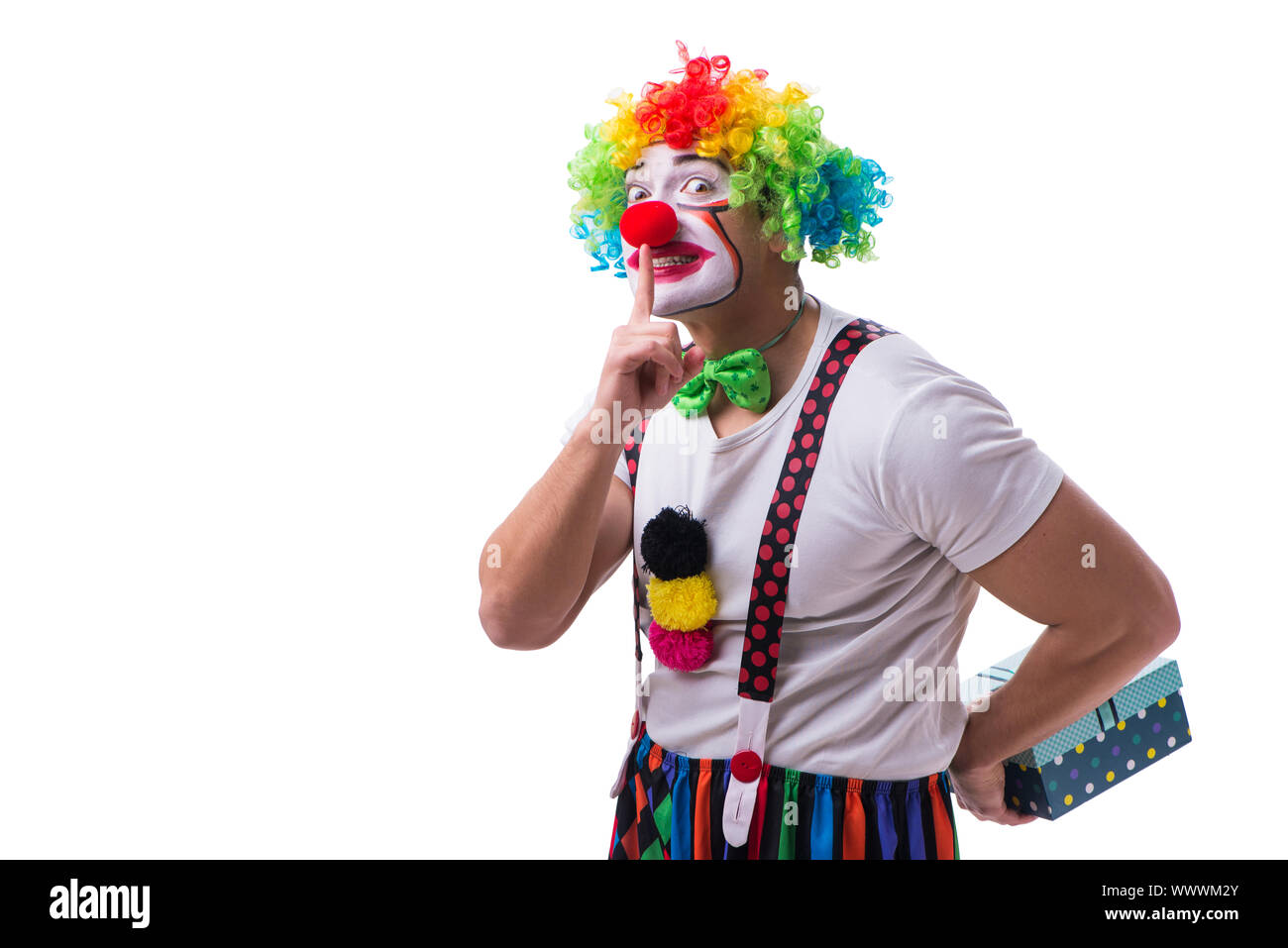 Funny clown with a gift present box isolated on white background Stock ...