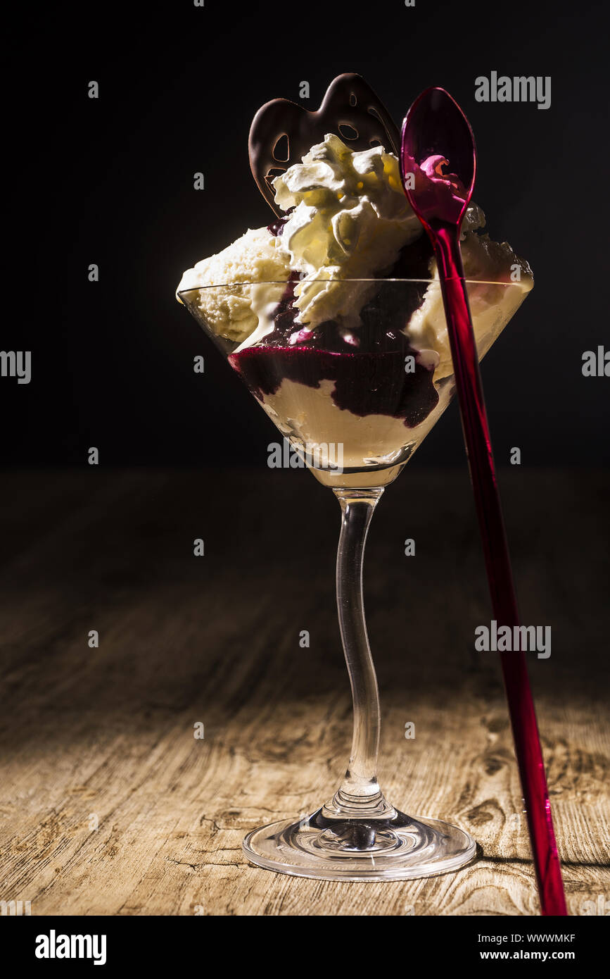 Vanilla ice cream with hot blueberries Stock Photo - Alamy