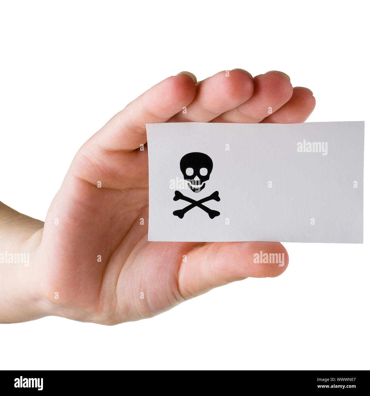 Paper card with the image black jolly Roger in a hand on a white ...
