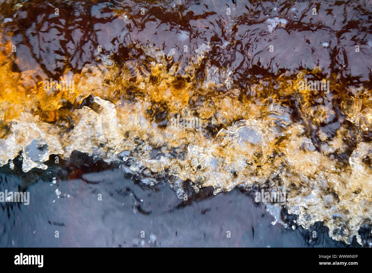 Sea rolling and receding water Stock Photo - Alamy