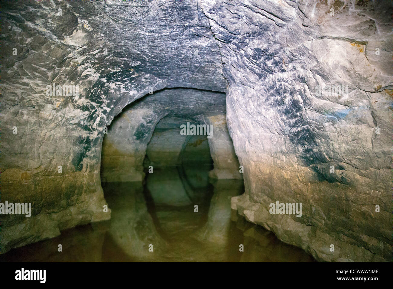 partially flooded underground caves catacomb Stock Photo - Alamy
