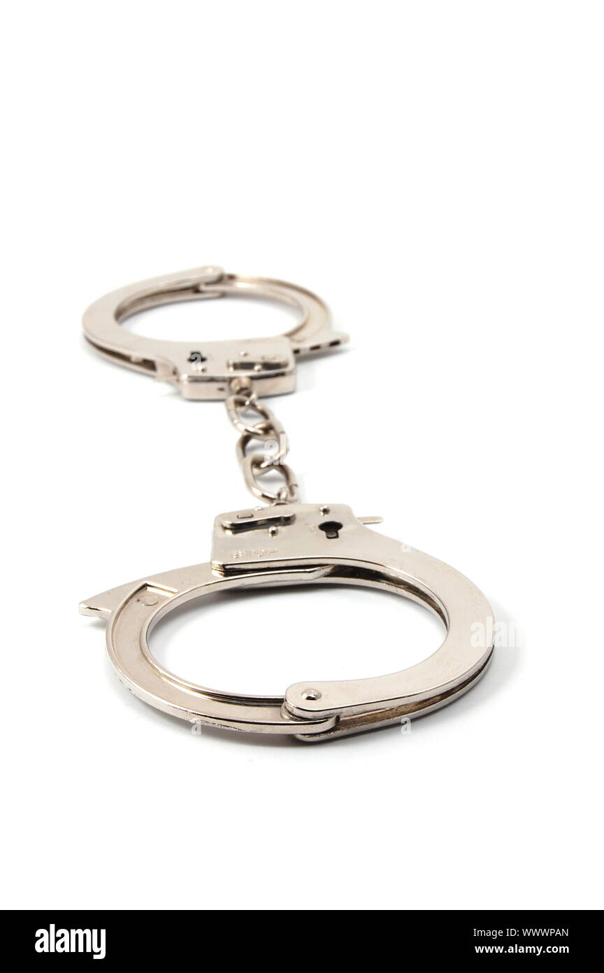 police handcuffs isolated on a white background Stock Photo - Alamy