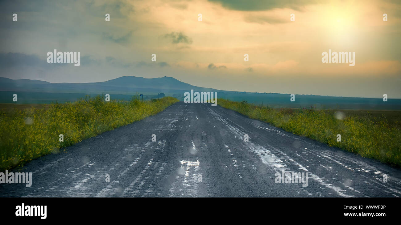 summer shower in desert a highway Stock Photo - Alamy
