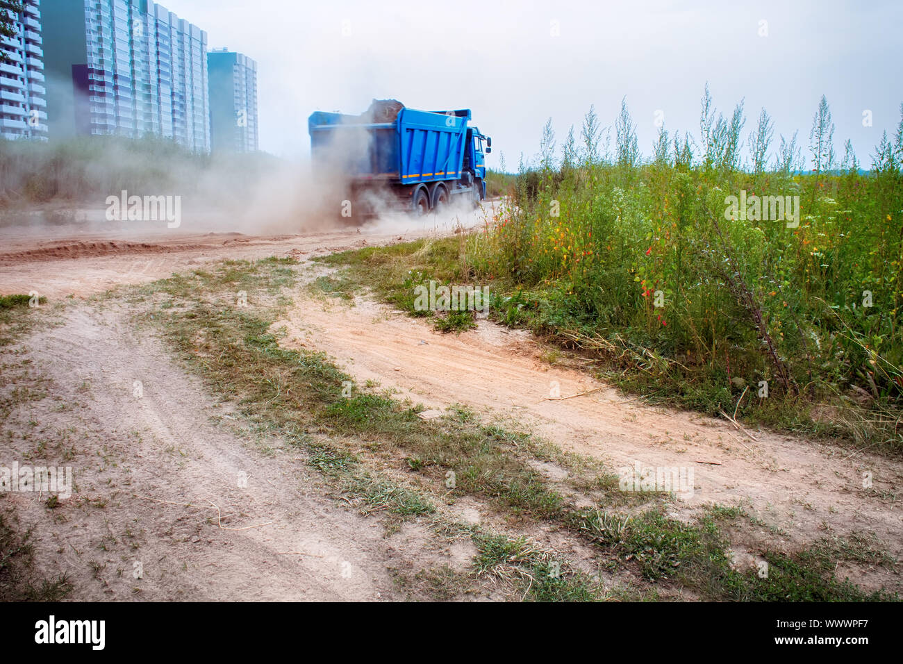 high-rise building in field Stock Photo - Alamy