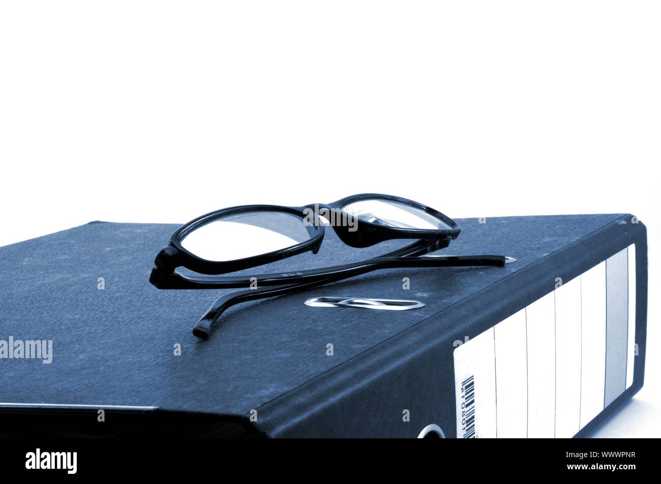 eye glasses and folder in the office showing paperwork concept Stock ...