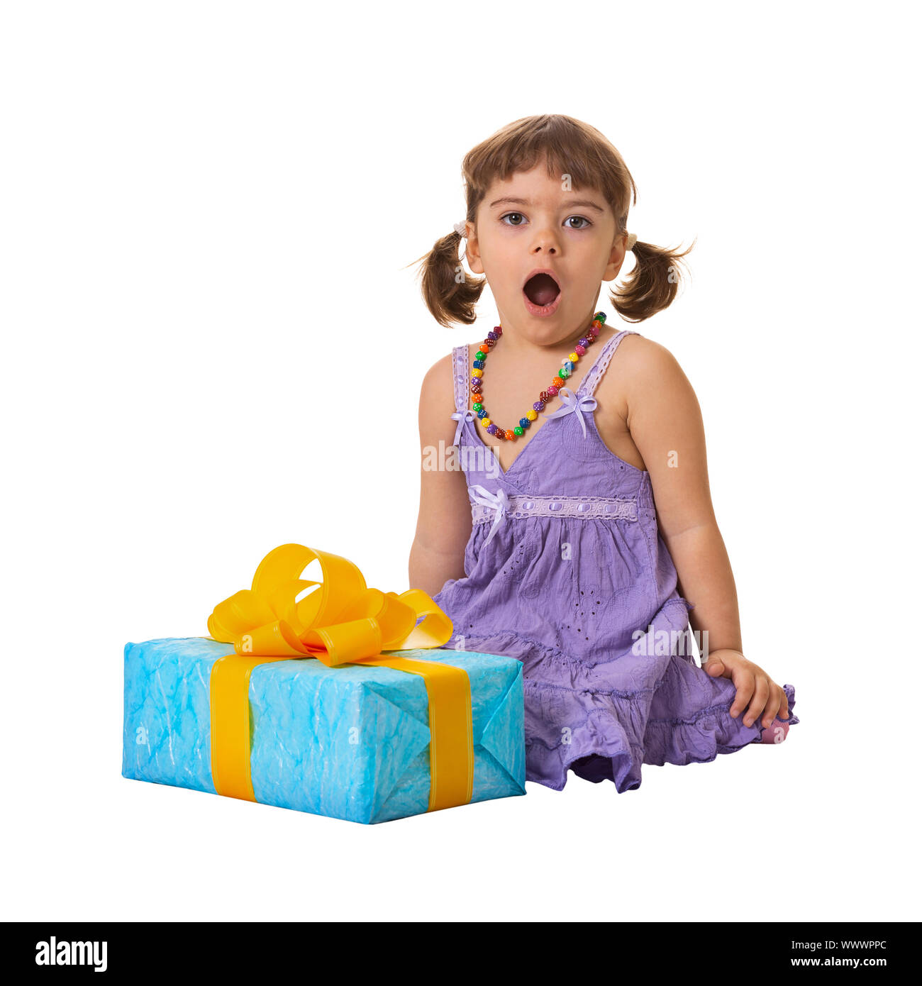 The little girl in deep shock from a large gift Stock Photo - Alamy
